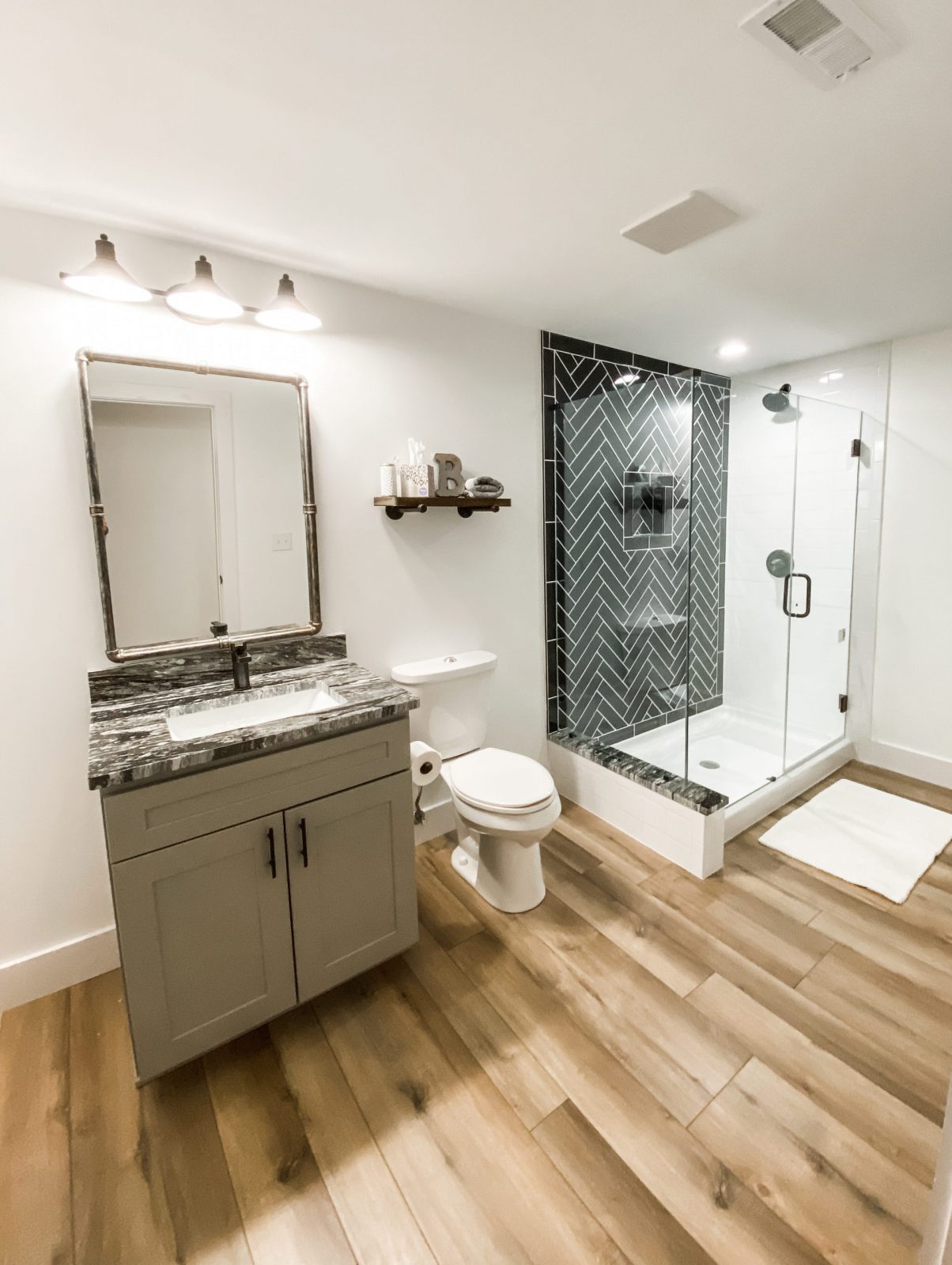 Bathroom Renovation | The Powell Buehler Group | Black and White Tile ...